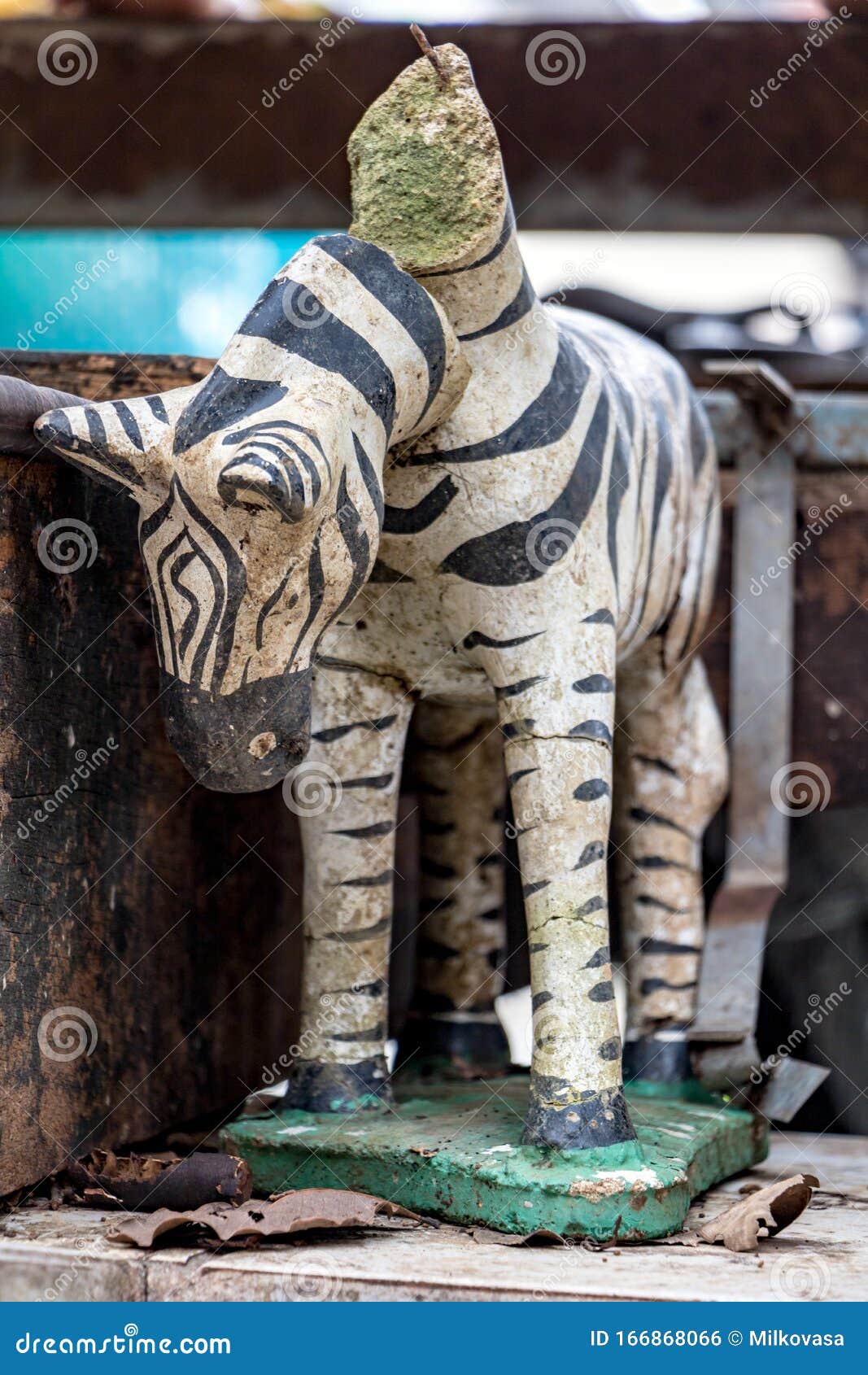 The Damaged Statue of Zebra with a Falling Head Stock Photo - Image of ...