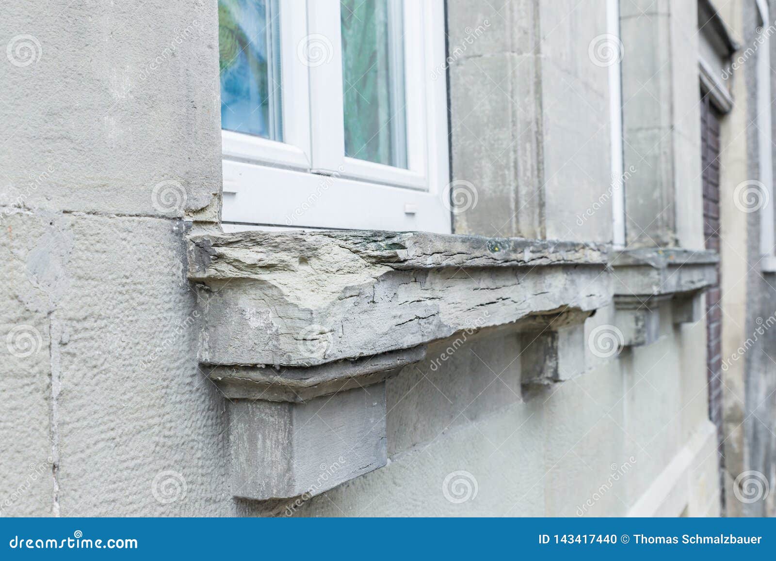 A Damaged Stone Window Back with Chipped Corners, Germany Stock Photo ...