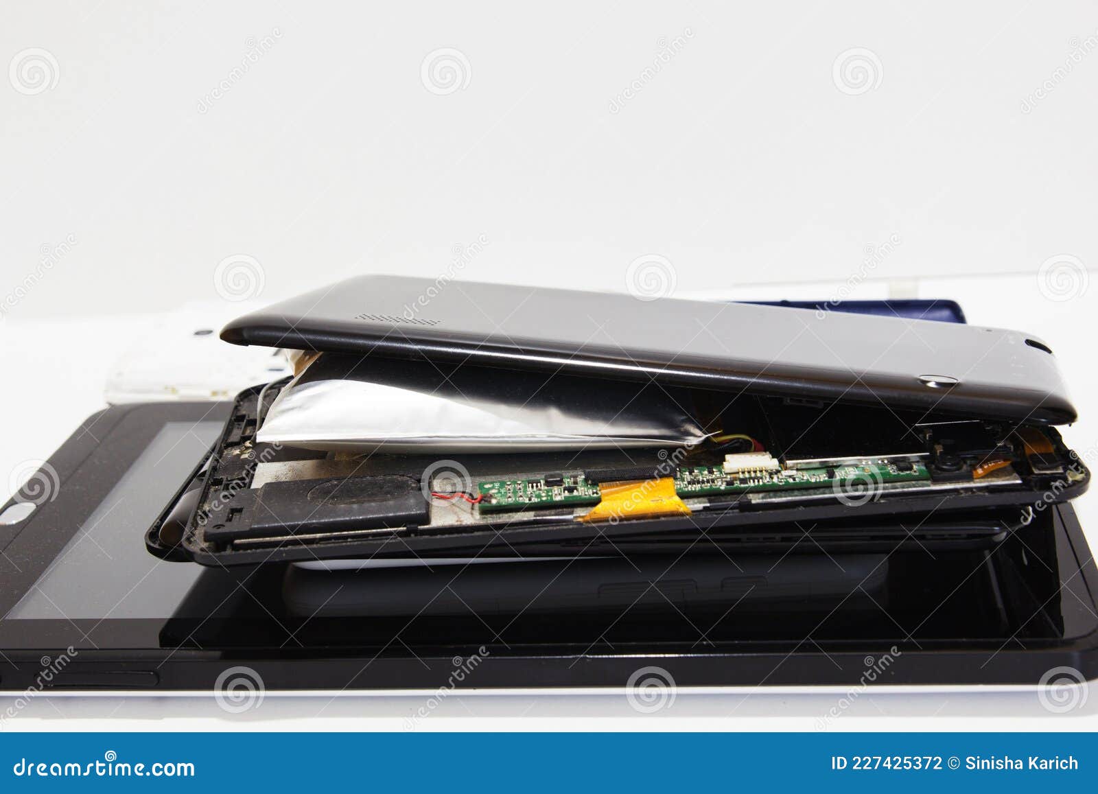 Damaged Swollen Li-polymer Battery In Tablet. Inflated Battery. Broken ...