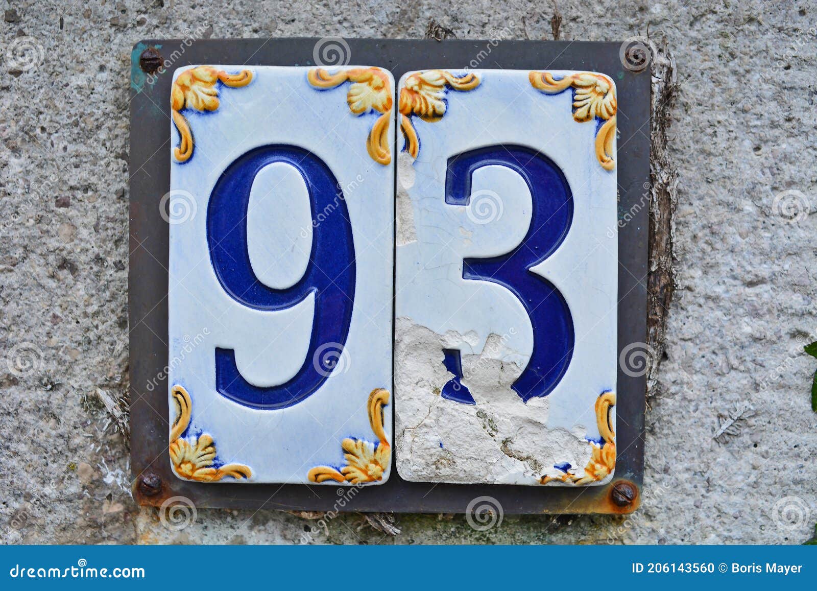 A Damaged Tile House Number Sign, Showing the Number Ninety Three Stock ...