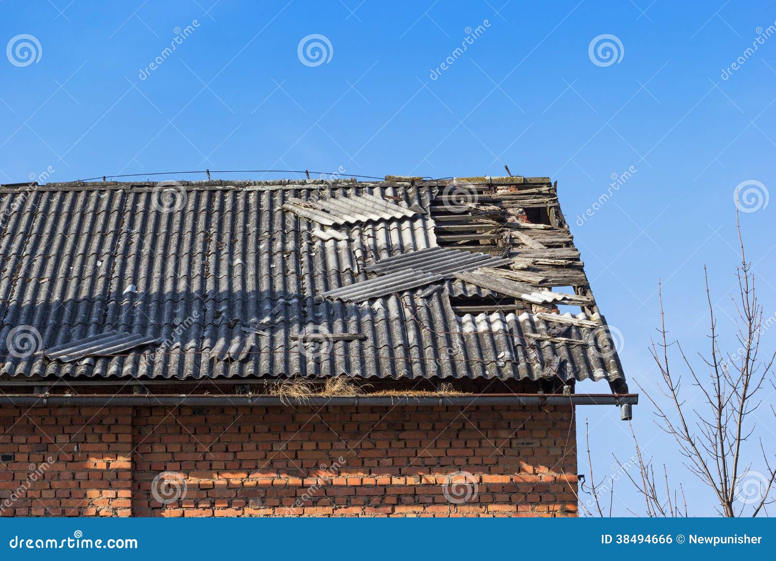 Damaged tile on the roof stock photo. Image of construction - 38494666