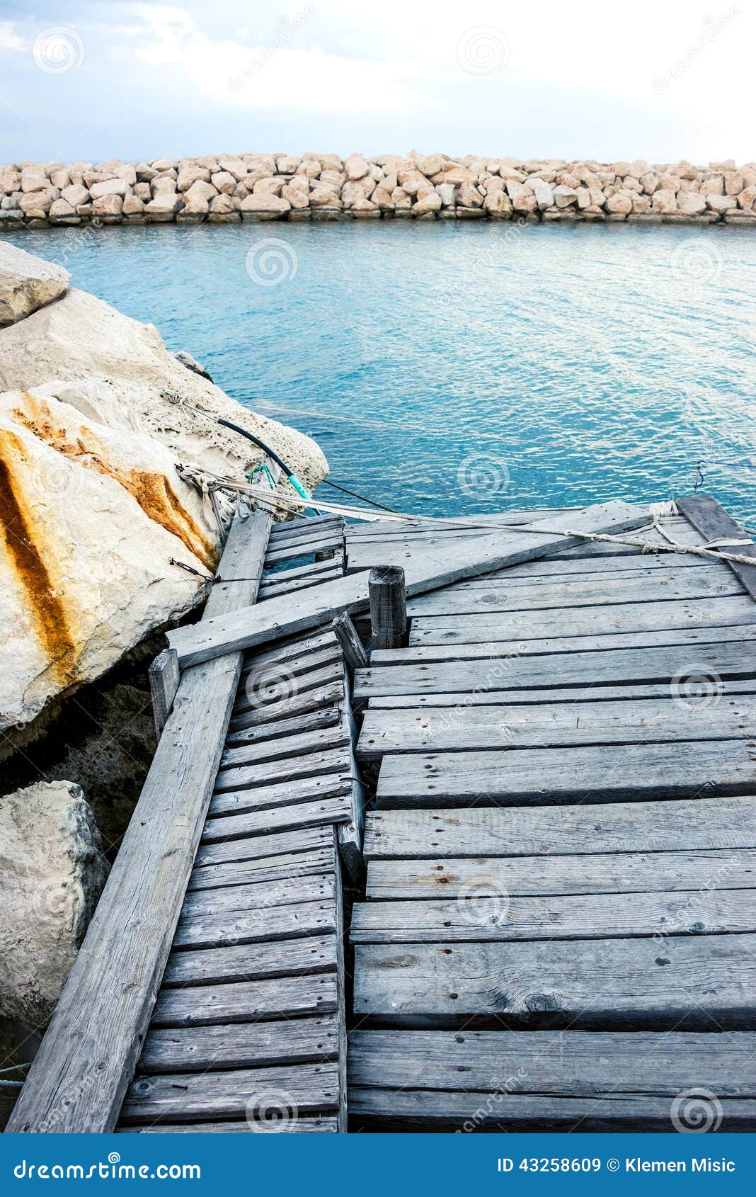 Damaged Wooden Pier with Rock Stock Image - Image of damaged, boat ...
