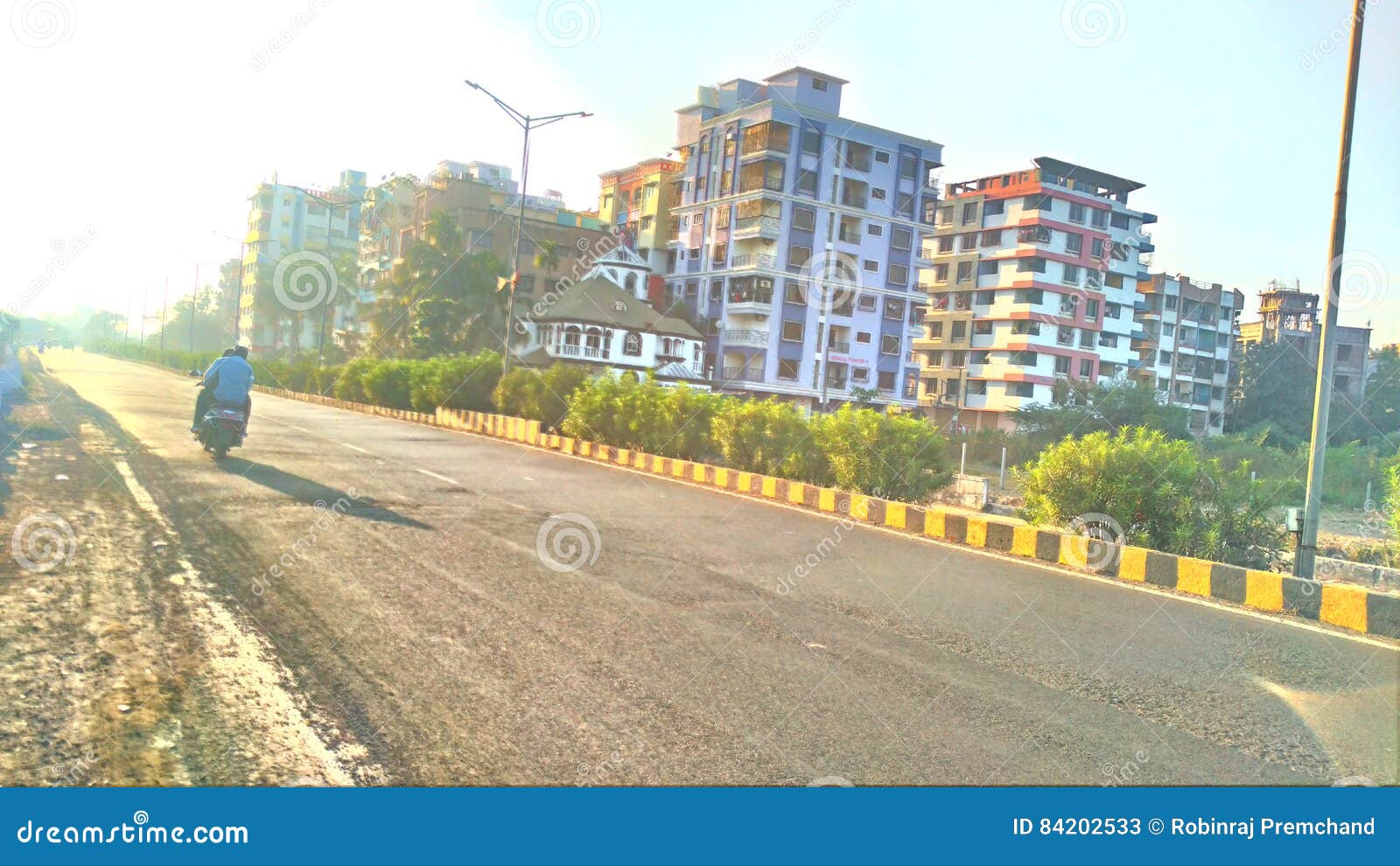 Daman road stock image. Image of home, daman, road, building - 84202533