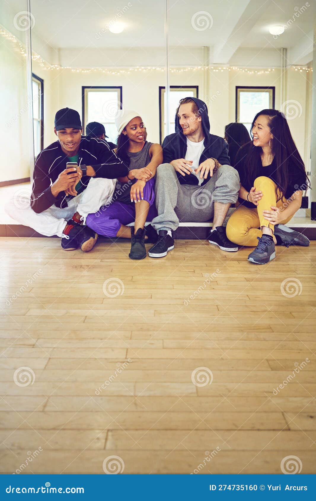 Dance Fam. a Group of Young Friends Hanging Out in a Dance Studio ...