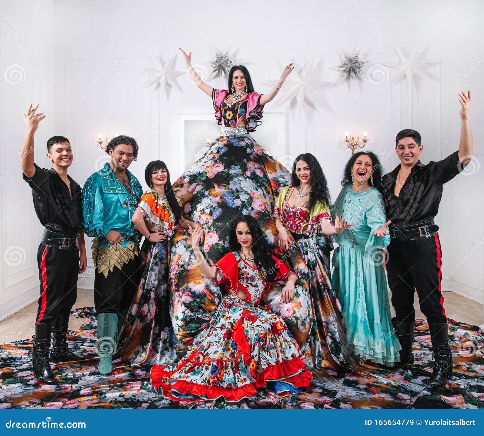 Dance Group in Gypsy Folk Costumes Posing on Stage. Stock Image - Image ...