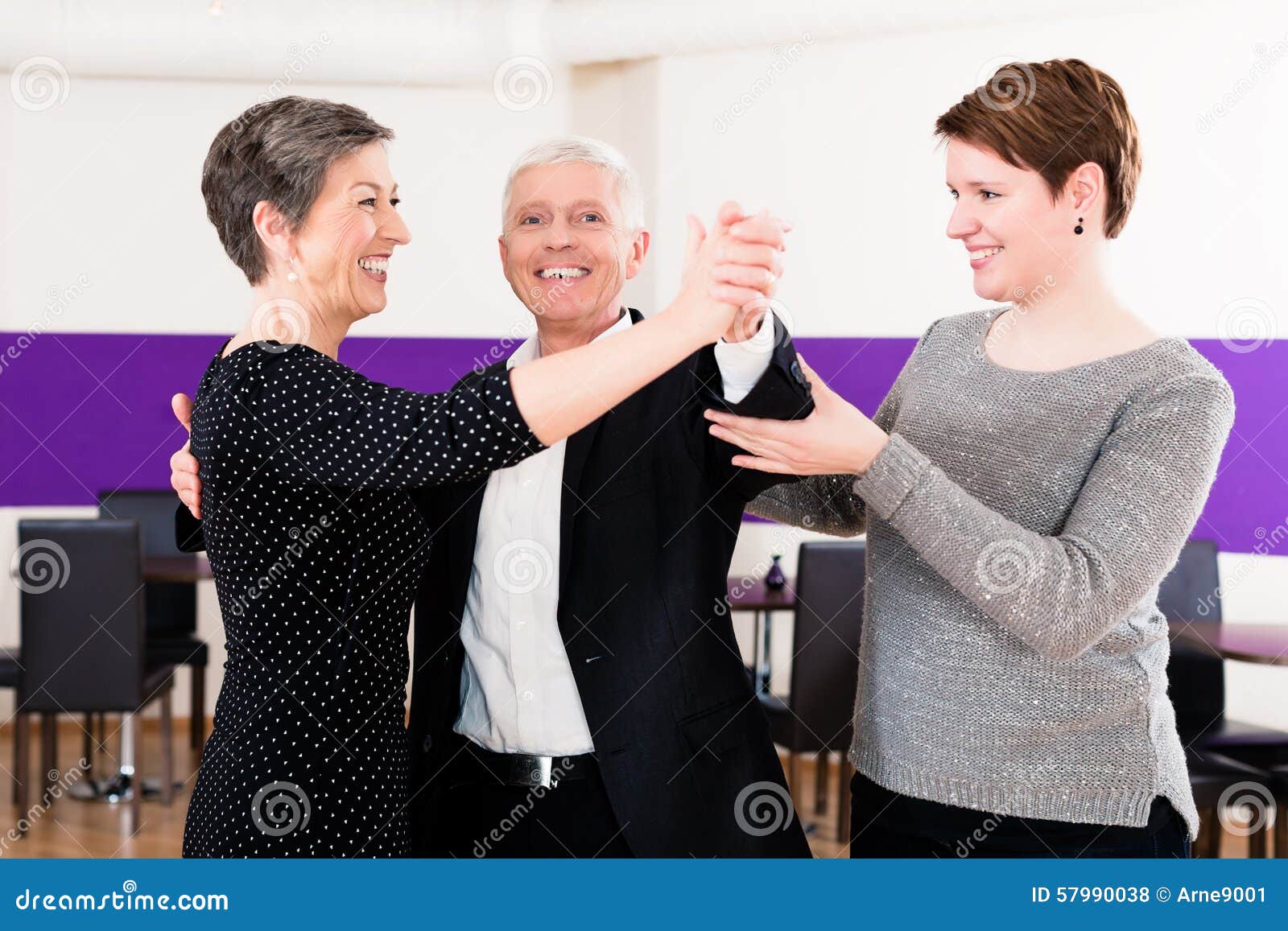 Dance Instructor with Senior Couple Stock Photo - Image of seniors ...