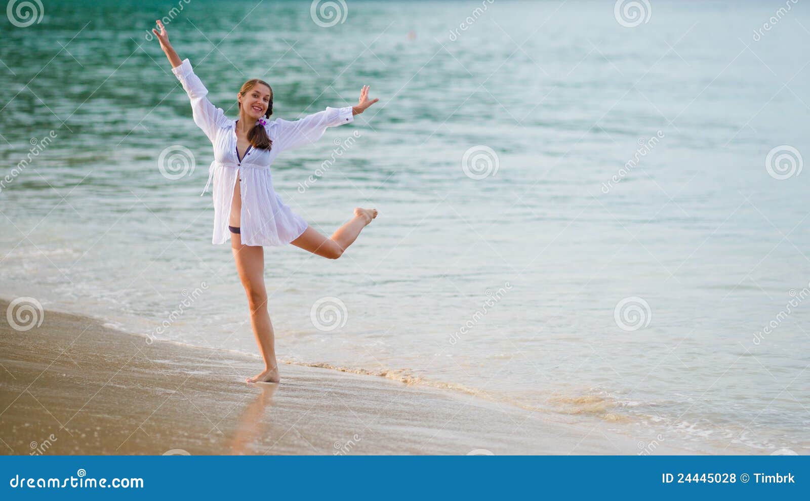 Dance in the sea stock photo. Image of dancing, beachwear - 24445028