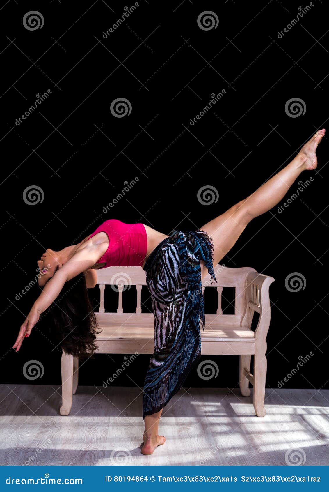 Dancer Bending Backwards with Her Legs Pointing Up Stock Photo - Image ...