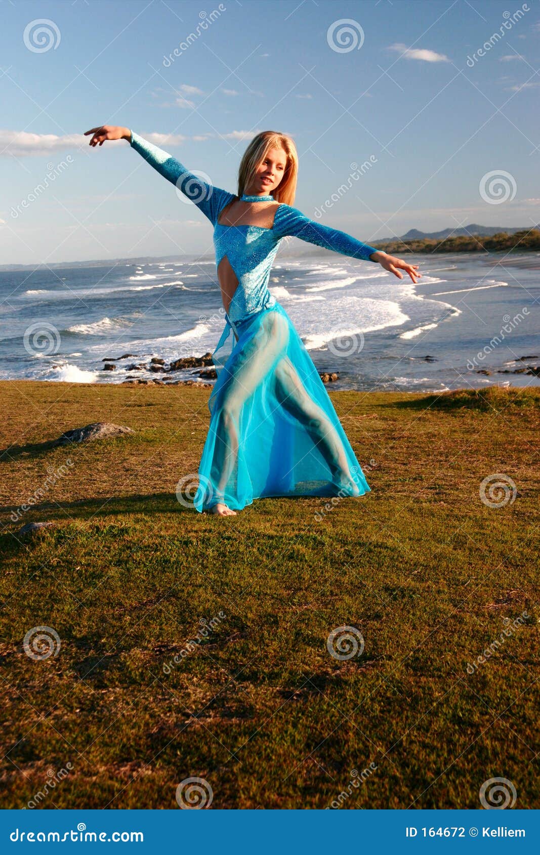 Dancer on cliff stock photo. Image of woman, blue, clouds - 164672