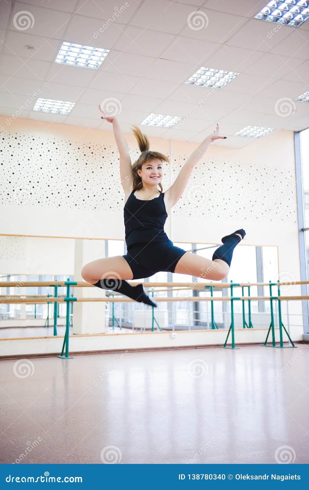 Dancer is Doing Exercises in the Ballet Class Stock Photo - Image of ...
