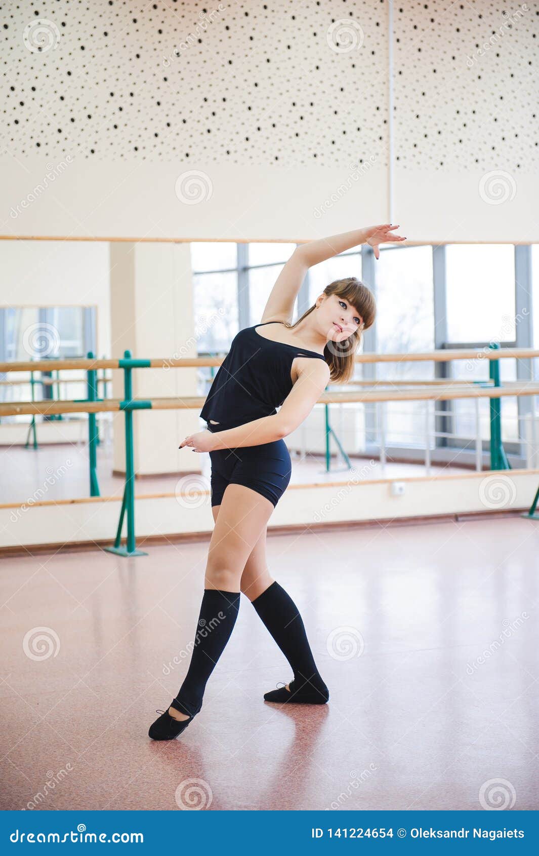 Dancer is Doing Exercises in the Ballet Class Stock Photo - Image of ...