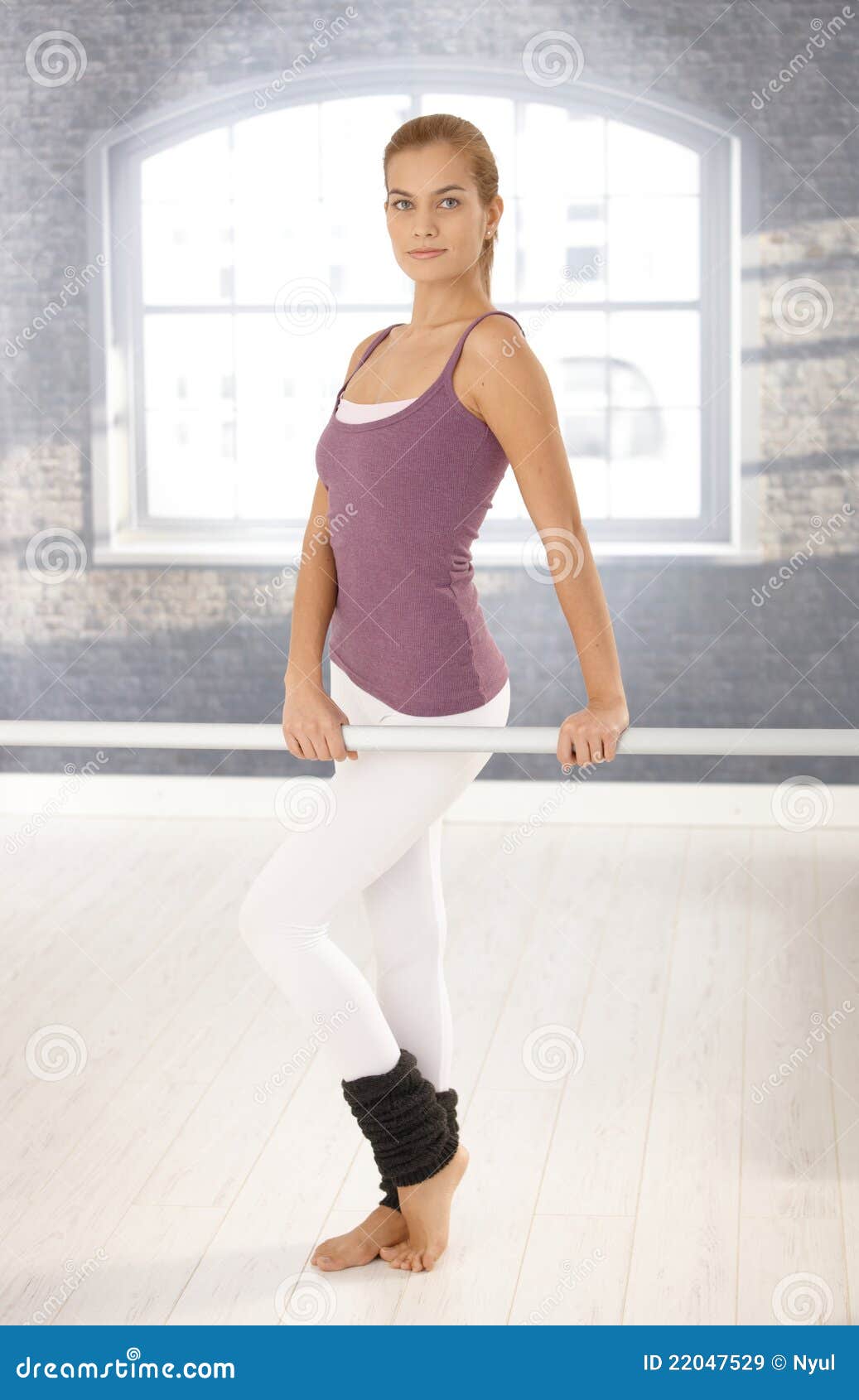 Dancer girl at ballet bar stock image. Image of face - 22047529