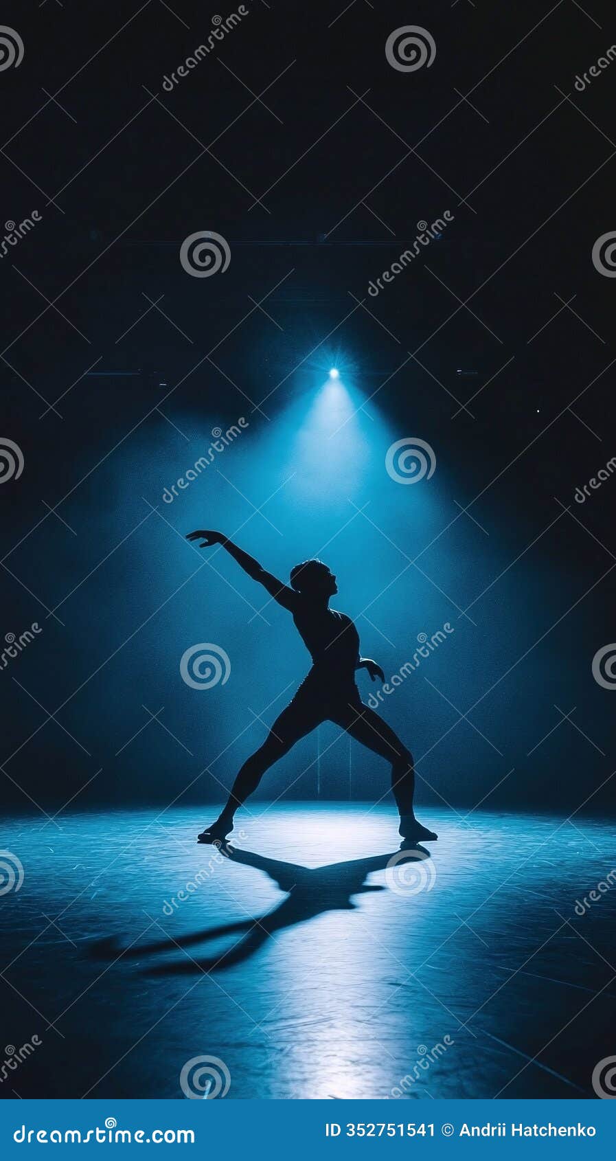 Dancer Performing a High-energy Routine on a Brightly Lit Stage Stock ...