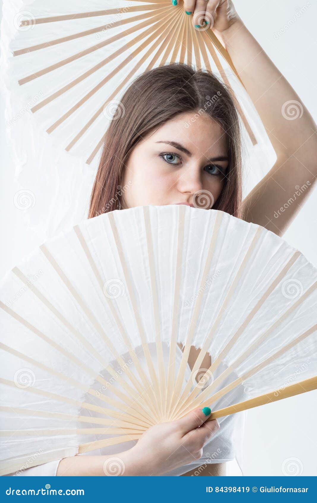 Dancer Posing with a Pair of Fan Stock Image - Image of studio ...