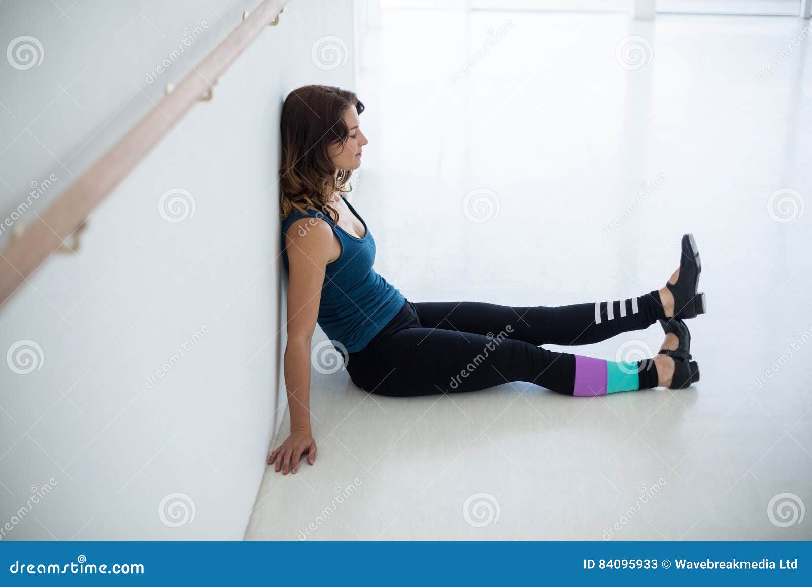 Dancer relaxing on floor stock image. Image of grace - 84095933