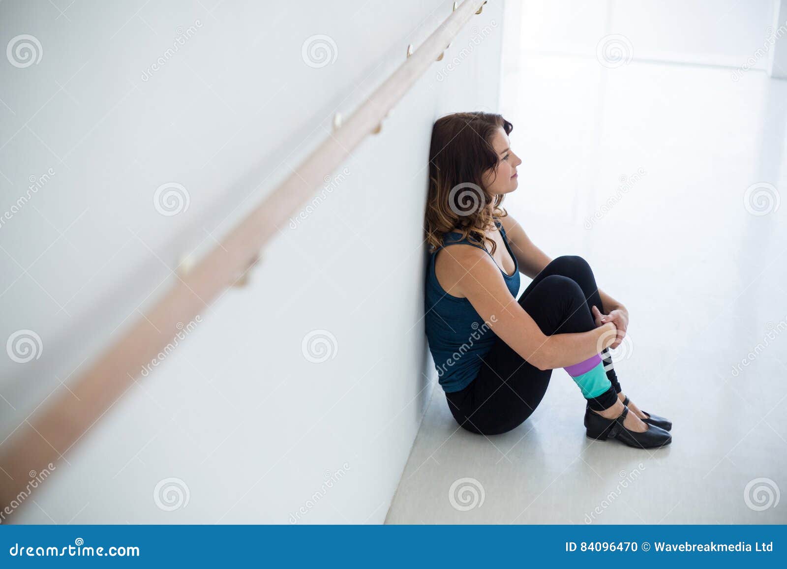 Dancer relaxing on floor stock photo. Image of professional - 84096470