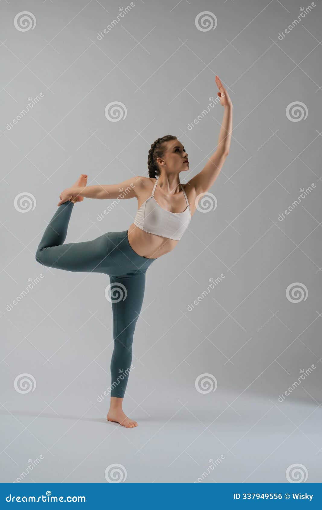 Dancer Performing a Graceful Pose in Studio during Daylight Hours Stock ...