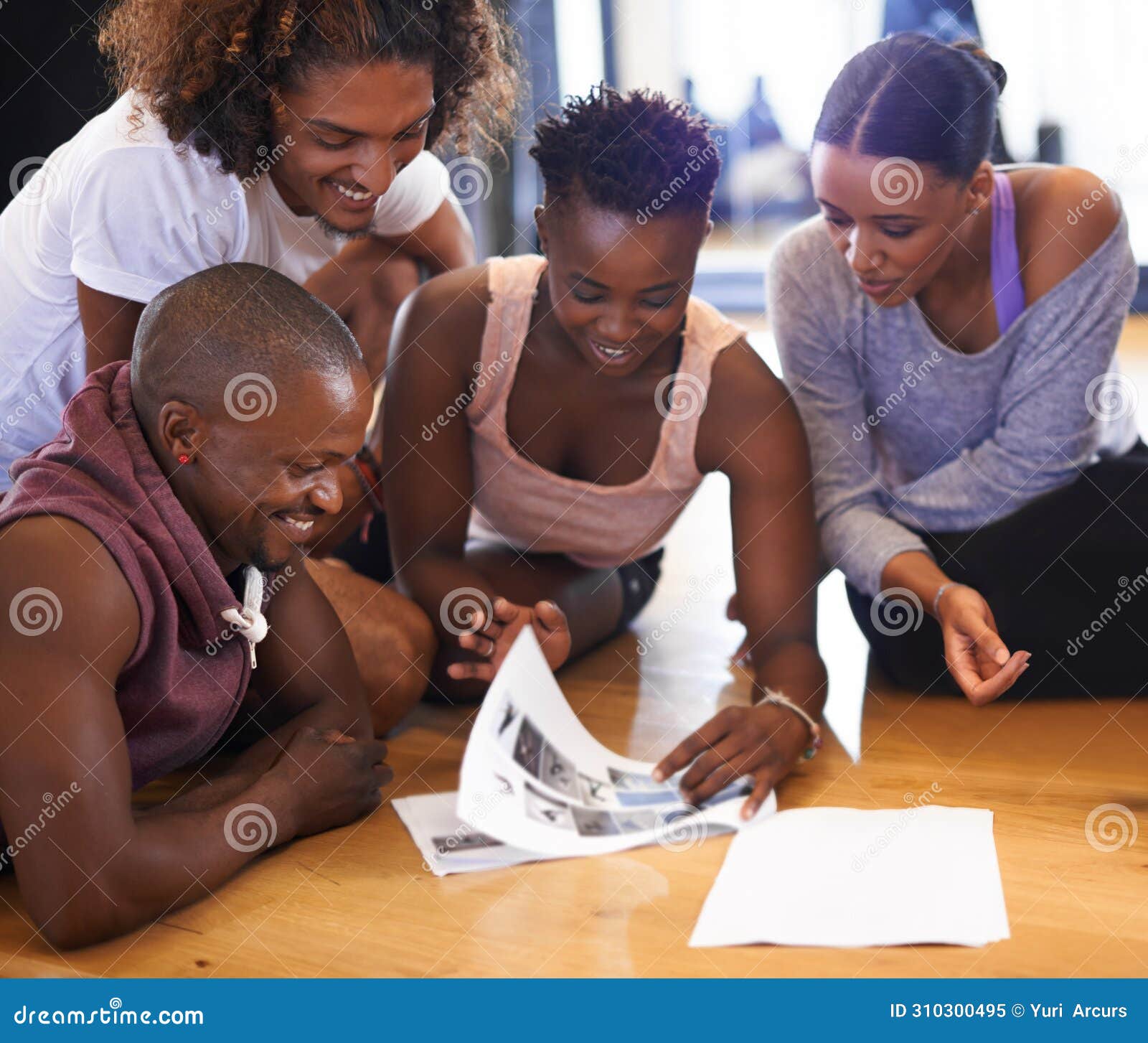 Dancer, Talking and Group on Floor with People Reading Paper, Catalog ...