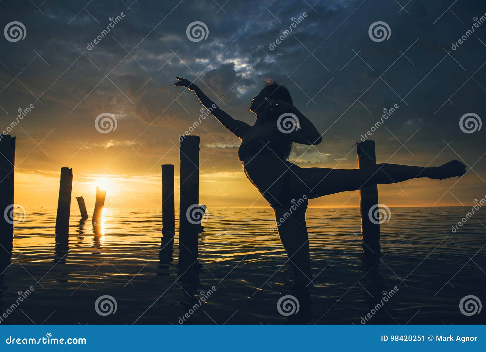 Dancer water sunset stock image. Image of beauty, attractive - 98420251