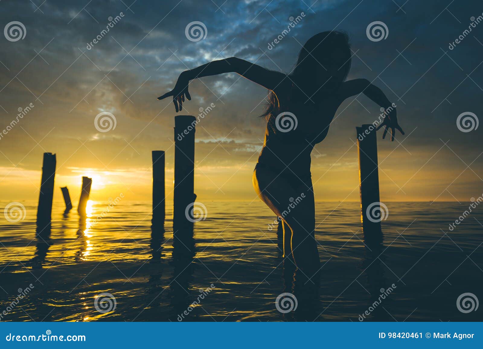 Dancer water sunset stock image. Image of girl, sport - 98420461