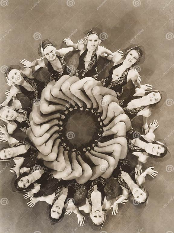 Dancers Forming a Circle with Their Legs Stock Photo - Image of ...