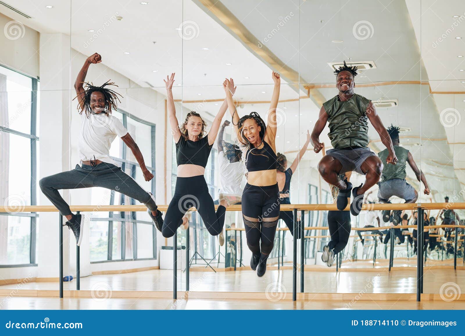 Dancers Jumping from Excitement Stock Photo - Image of action, indoors ...