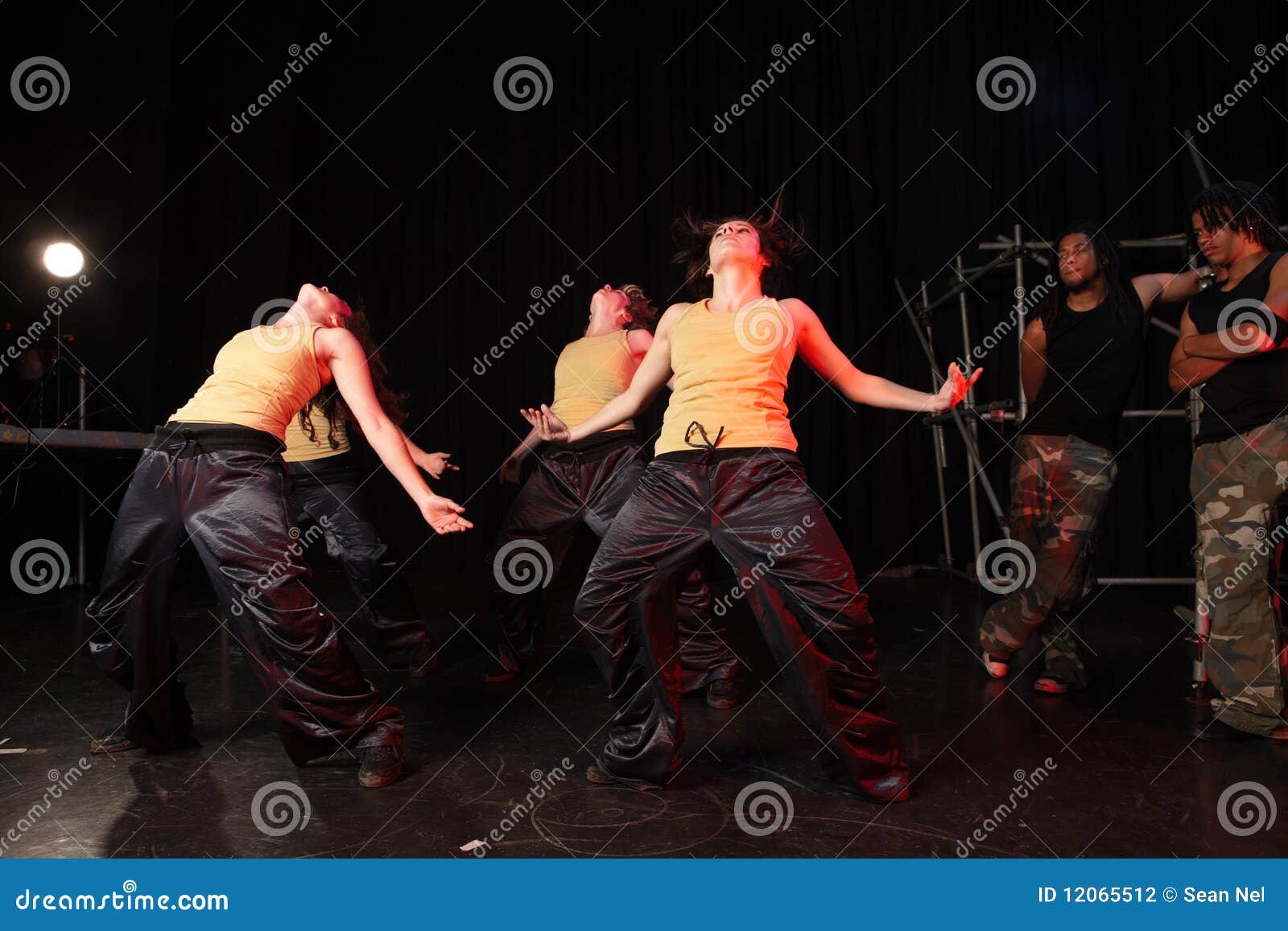Dancers on stage stock photo. Image of cargo, athletic - 12065512