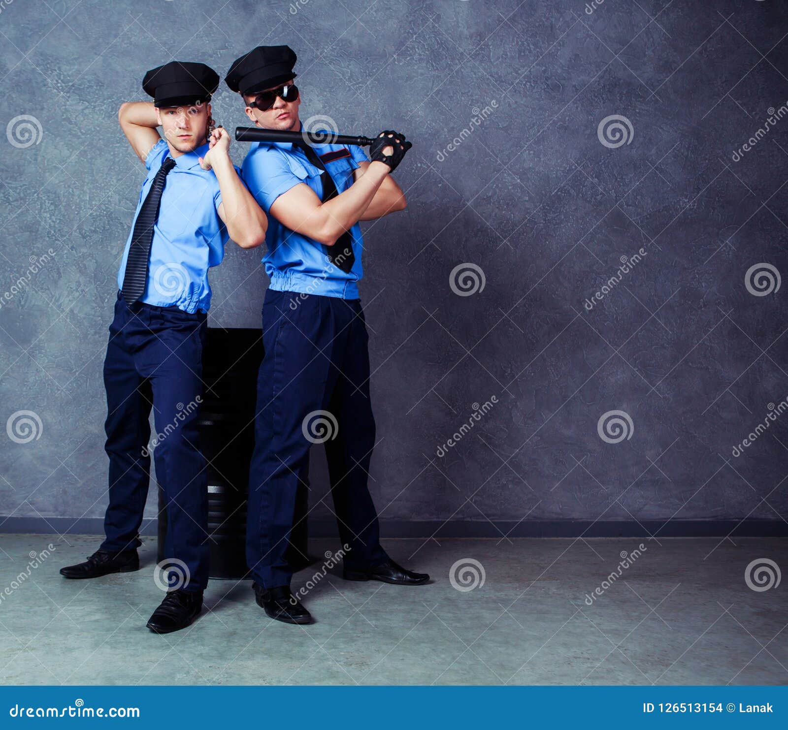 Dancers Wearing Costumes of Policemen Stock Photo - Image of masculine ...