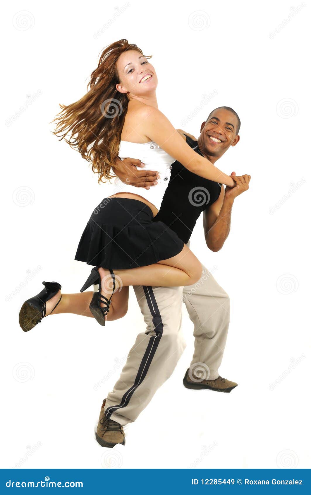 Dancing Couple with Latino Instructor Stock Image - Image of enjoyment ...