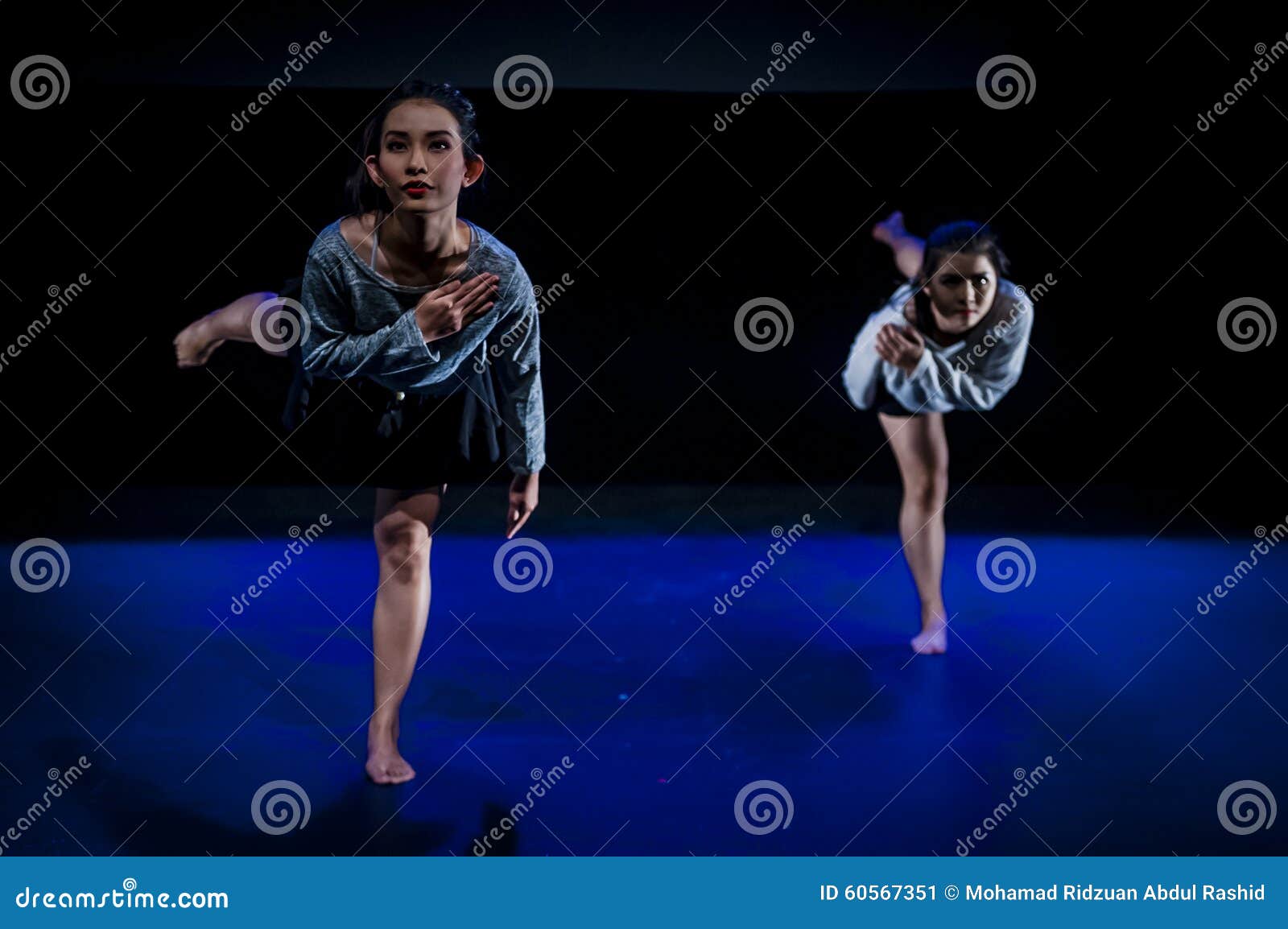 Dancing in dark studio editorial photo. Image of industry - 60567351