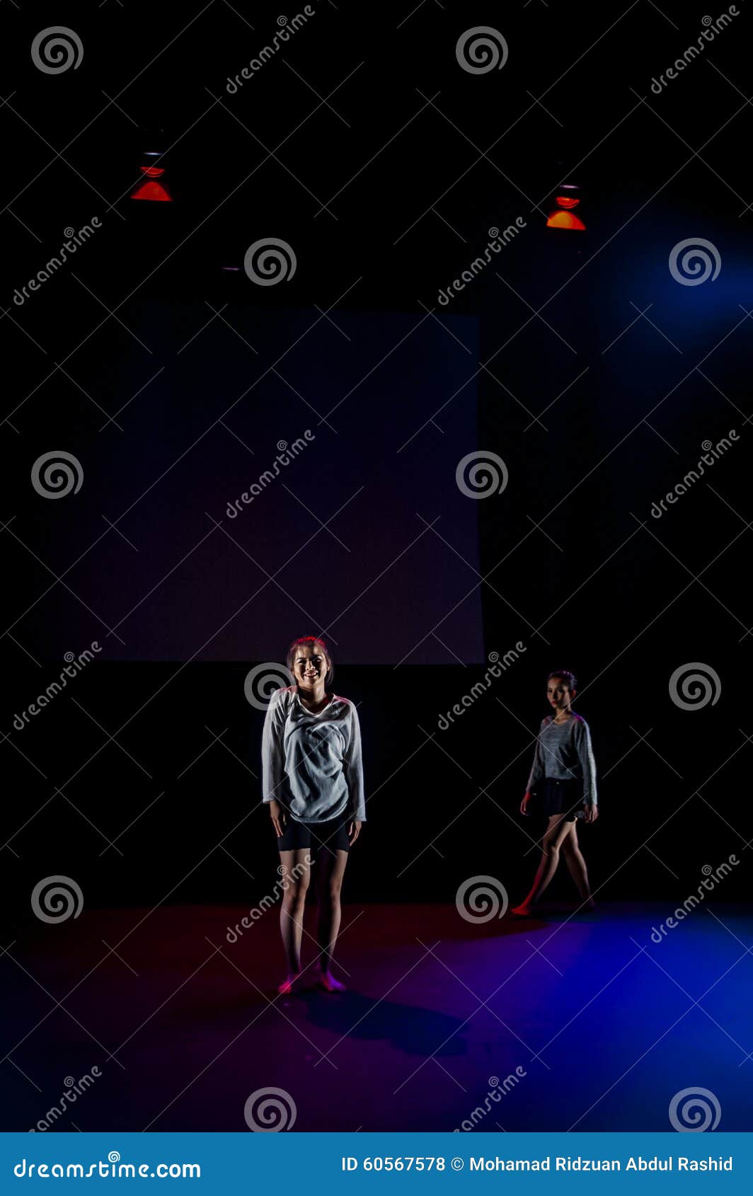 Dancing in dark studio editorial stock photo. Image of industry - 60567578
