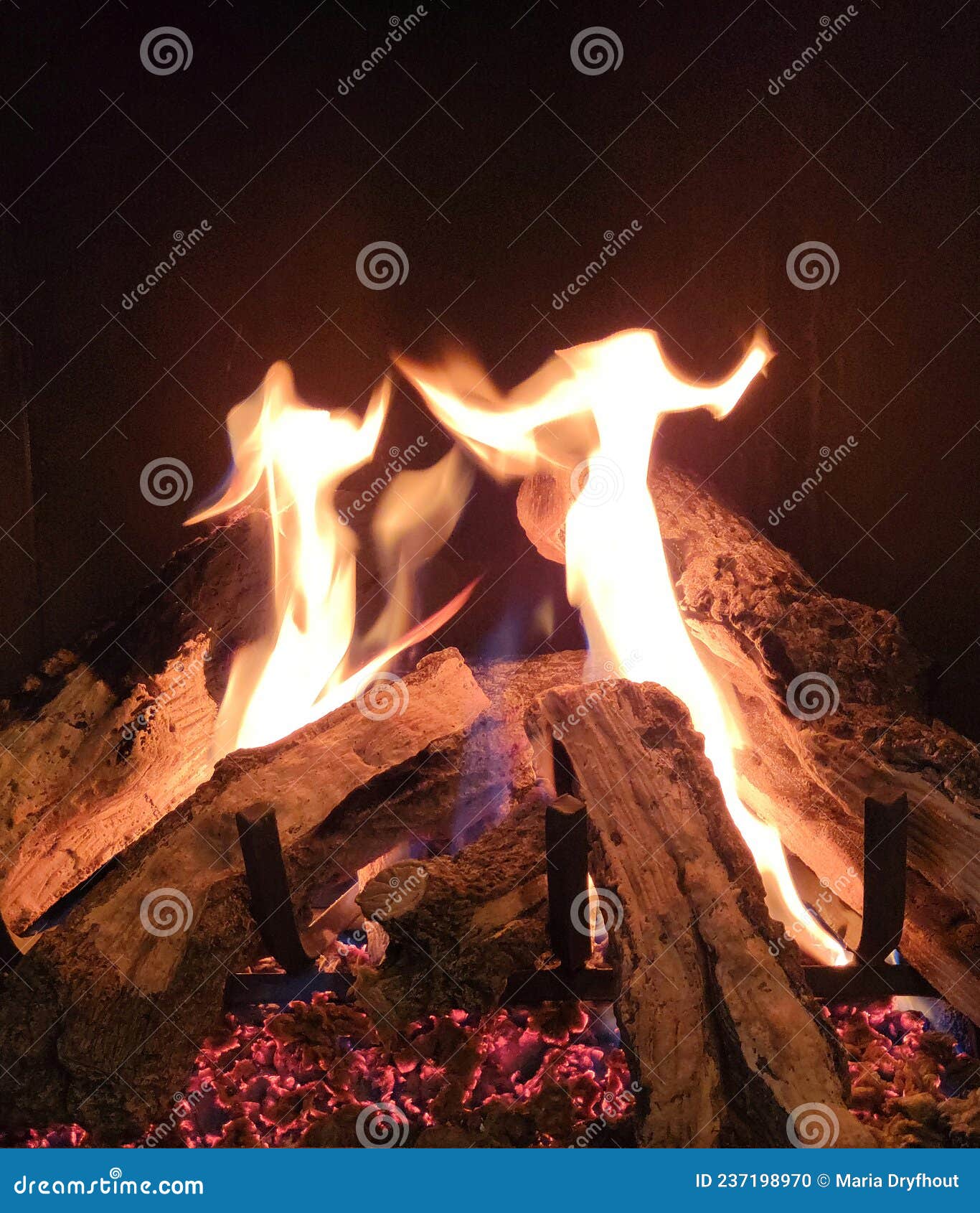 Dancing Flames in Fireplace with Logs Stock Photo - Image of flame ...