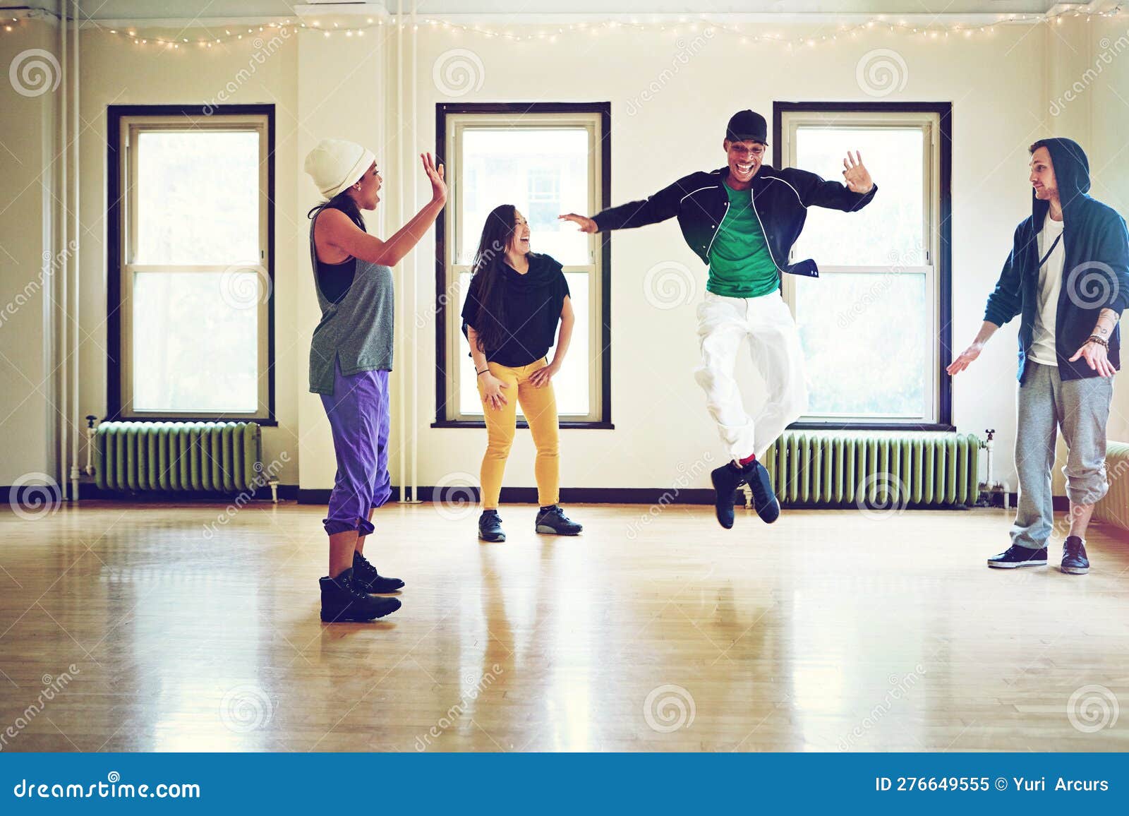 Dancing is a Full Body Experience. a Group of Young Friends Dancing ...