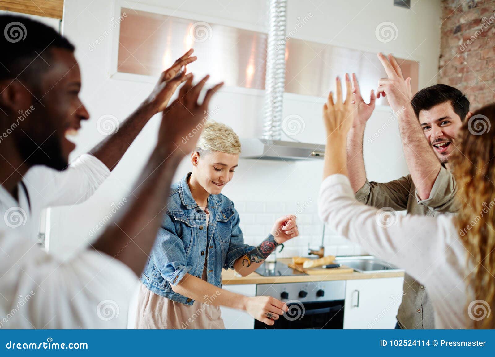 Dancing in the kitchen stock photo. Image of adult, home - 102524114