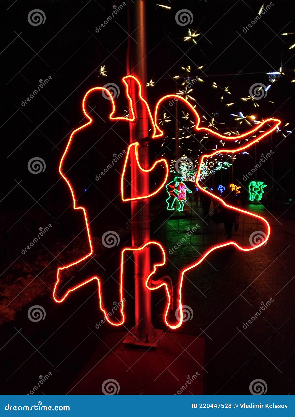 Dancing neon couple stock photo. Image of light, night - 220447528