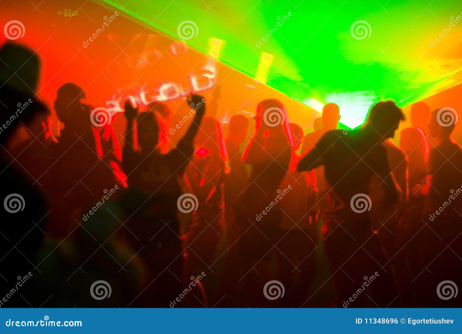 Dancing People in Red Disco Light Stock Photo - Image of event ...