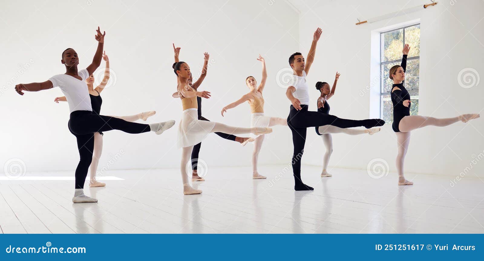Dancing is the Poetry of the Foot. a Group of Ballet Dancers Practicing ...