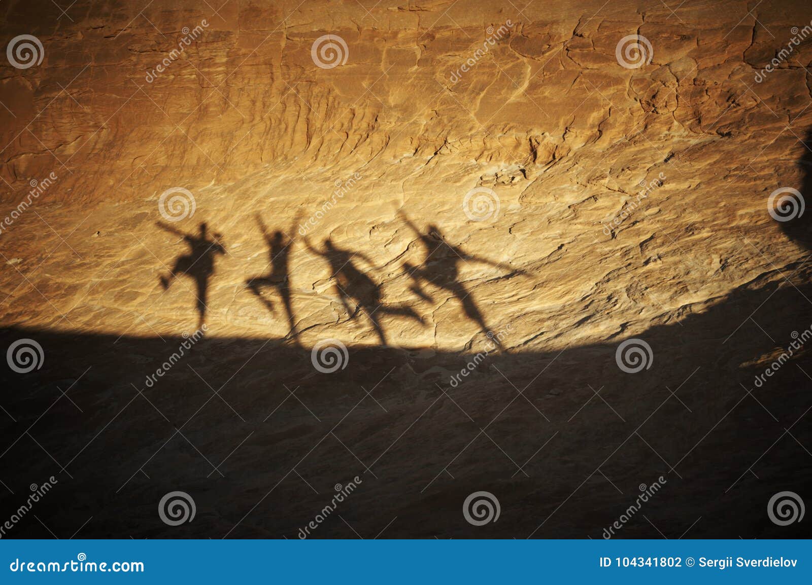 Dancing Shadows on the Rock in the Desert Stock Photo - Image of ...