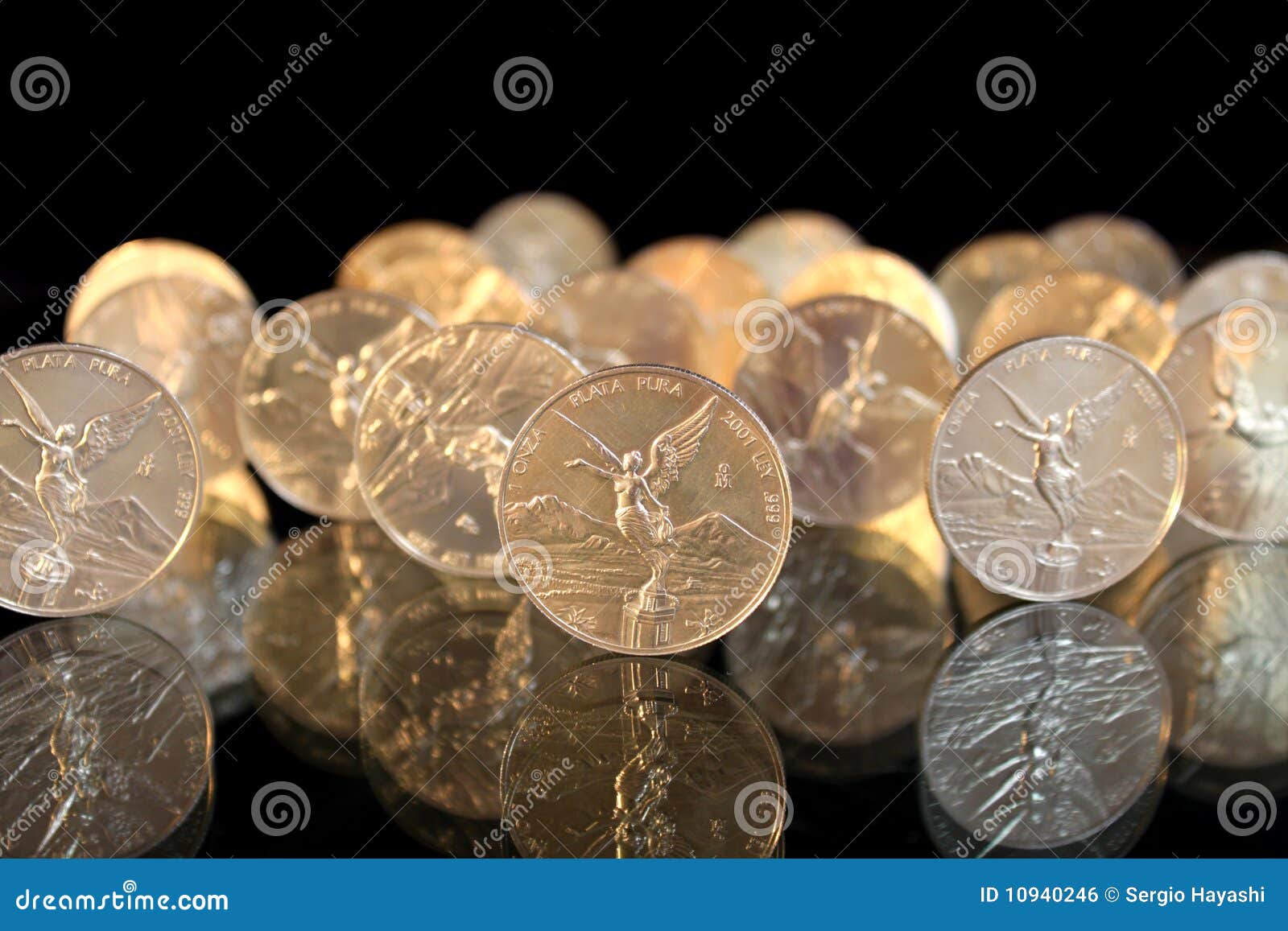 Dancing silver coins stock photo. Image of macro, currency - 10940246