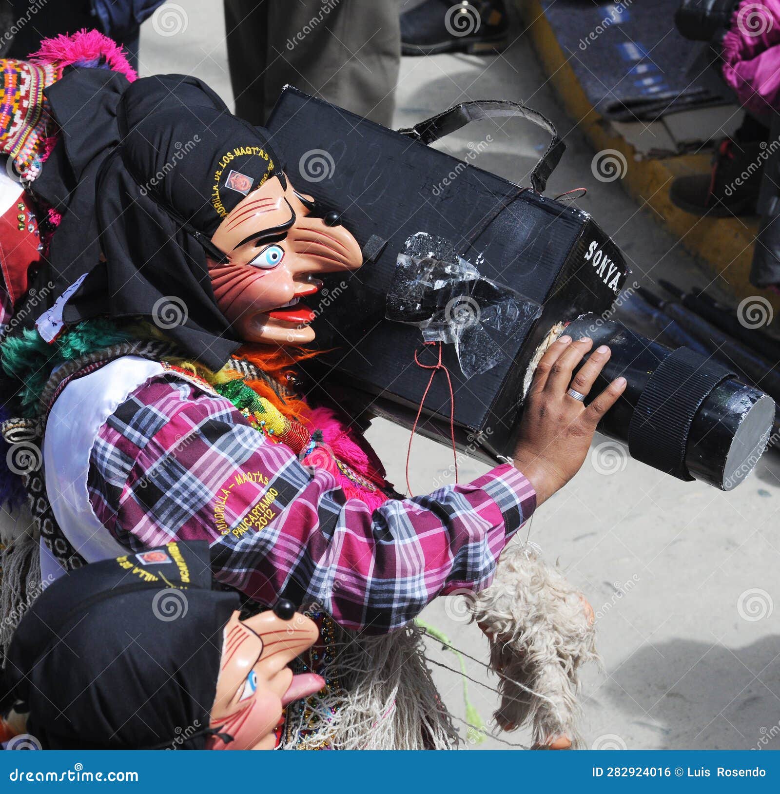 Dancing and Singing Devotees with Mask in the Streets of the Town the ...