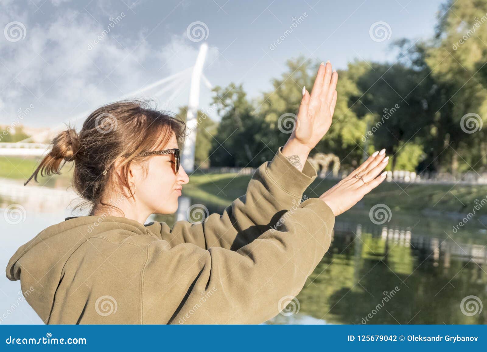 Dancing woman at the river stock photo. Image of glasses - 125679042