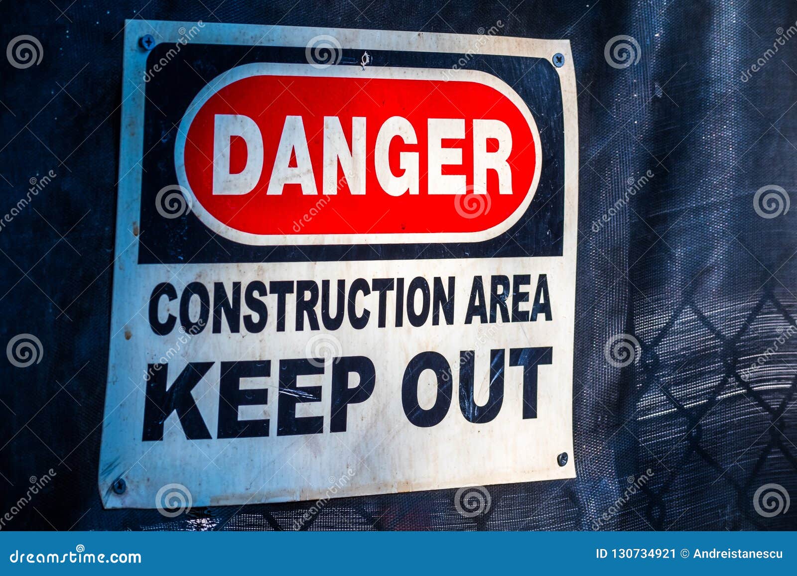Danger Construction Site Keep Out Sign With Red Crane Over City Stock ...