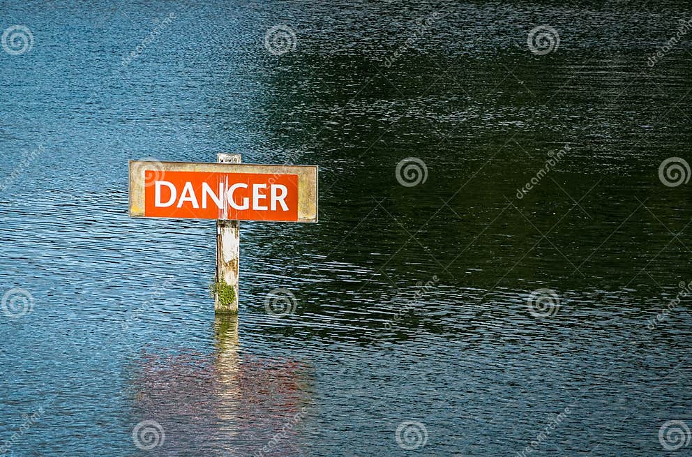 Danger Hazard Warning Sign in River Stock Image - Image of risk ...