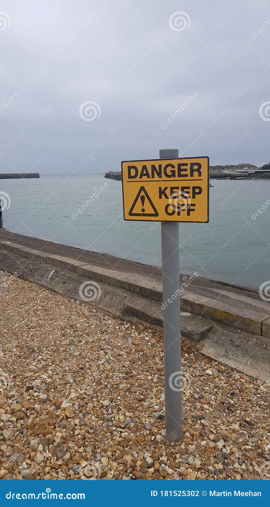 Danger Keep Off Sign beside Sea Harbour. Stock Photo - Image of wall ...