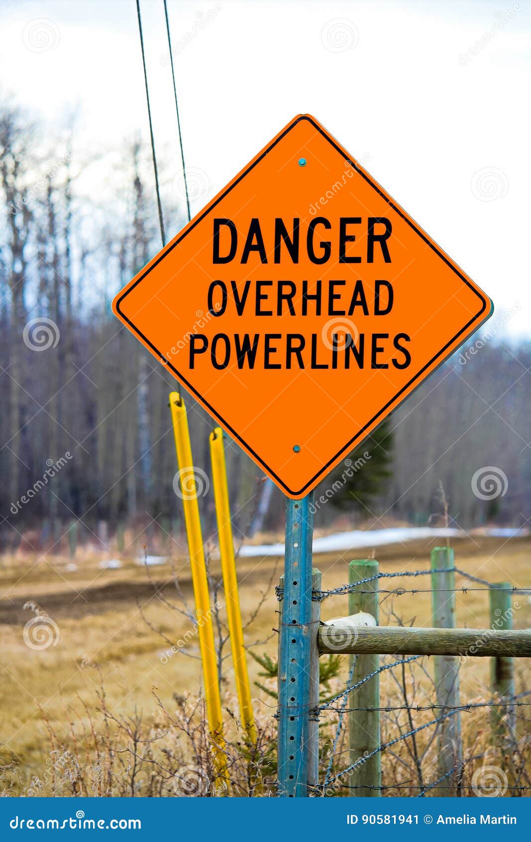 Danger, Overhead Powerlines Warning Sign With Visible Power Lines Stock ...