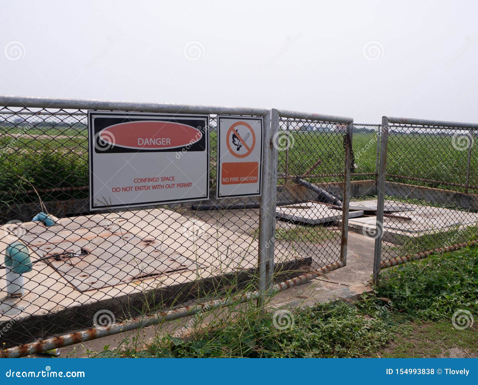 Danger, Restricted Area Sign on Wire Mesh Fence Stock Photo - Image of ...