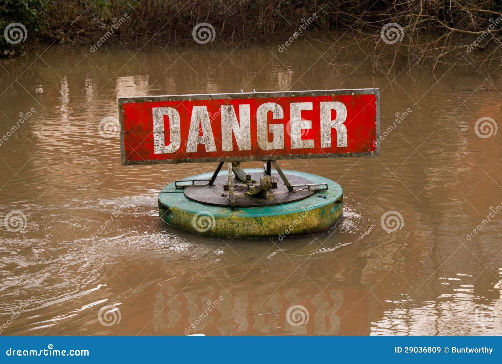 Danger Sign on Fast Flowing River Stock Image - Image of danger ...