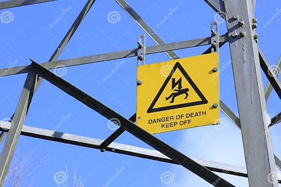 Danger sign on a pylon. stock photo. Image of symmetrical - 38448814