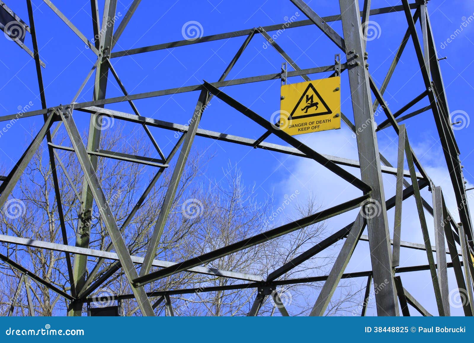 Danger sign on a pylon. stock image. Image of metal, clouds - 38448825