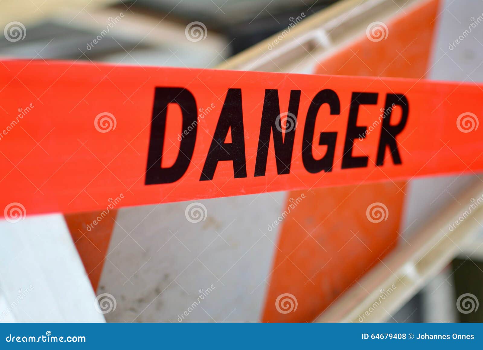 Danger sign on red tape stock photo. Image of cordon - 64679408